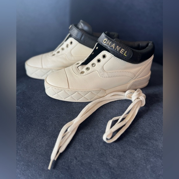 CHANEL | Shoes | Chanel Cream And Black Hightop Sneakers | Poshmark